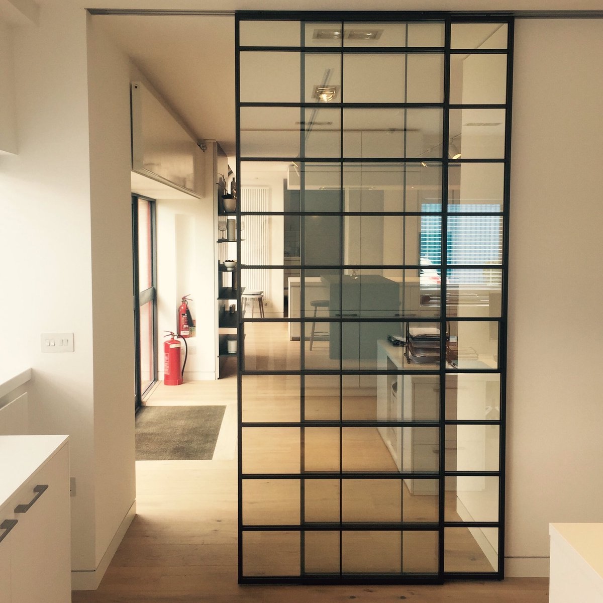 Noctum | Rimadesio Soho schuifdeur met vlakverdeling - architectenweb.nl