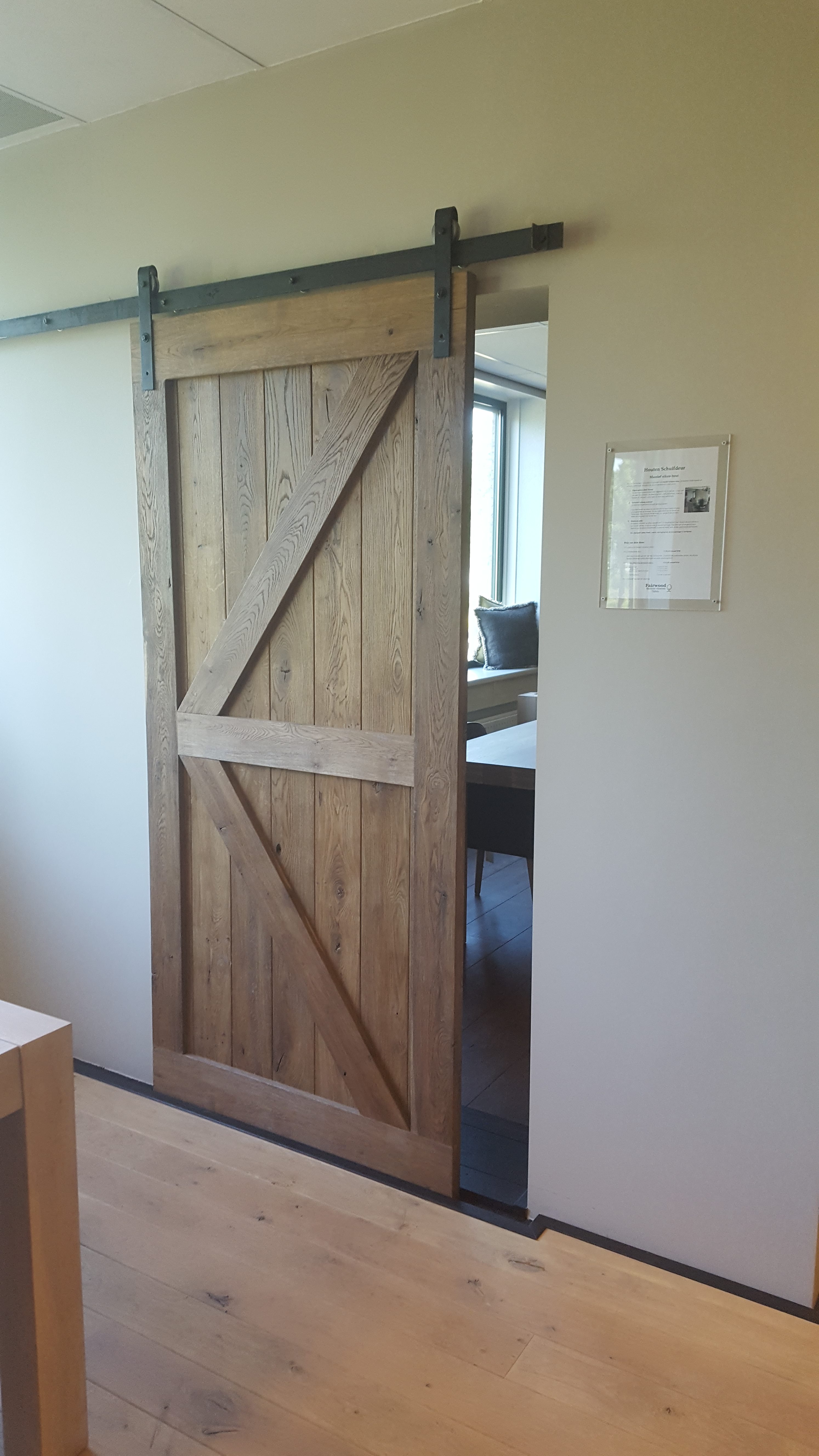 Fairwood | Massieve houten schuifdeur - architectenweb.nl